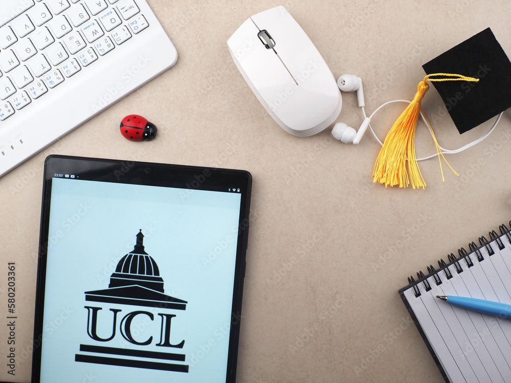 In this photo illustration, UCL logo seen displayed on a tablet. Stock ...