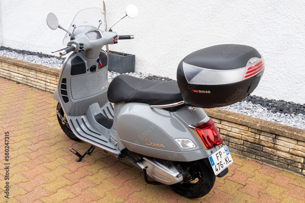vespa text sign on side grey panel with brand logo on new modern ...