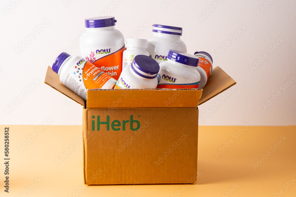 Vitamins, minerals and micronutrients from iHerb box. Lots of different ...