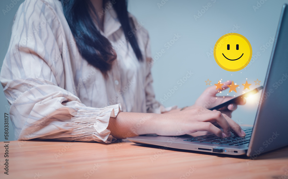 Woman hand doing online assessment on satisfaction level, let customer ...