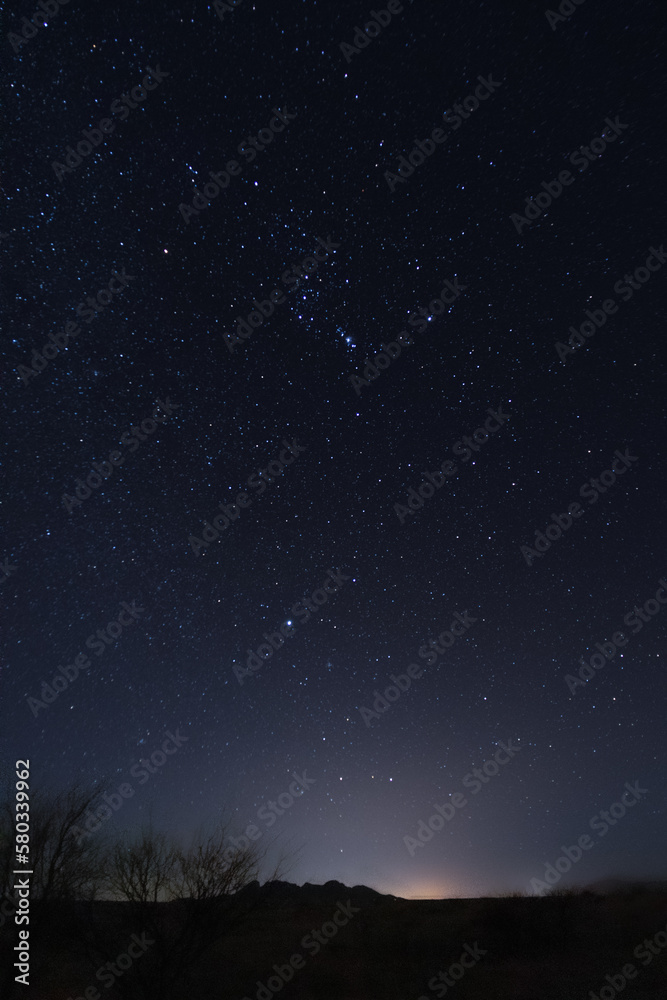 The Orion Nebula on a field of stars in the night sky. Stock Photo ...