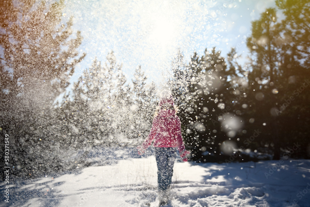 Portrait of a young girl with blonde hair, dressed in bright pink ...