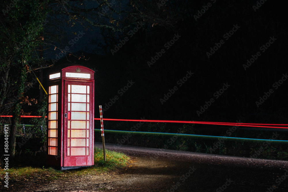 British red telephone box at night with light trails Stock Photo ...