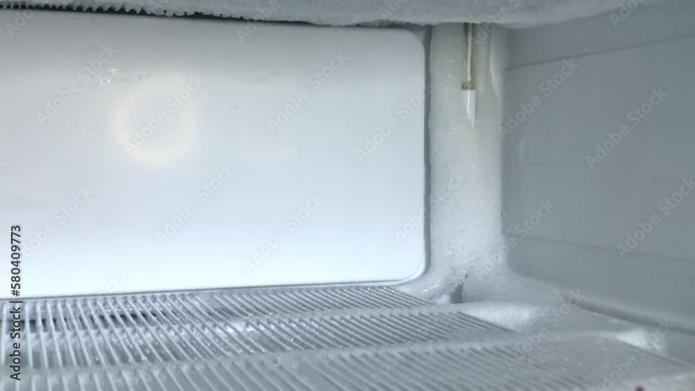 Cleaning. Defrosting of the milking chamber. Frozen snow on the walls ...