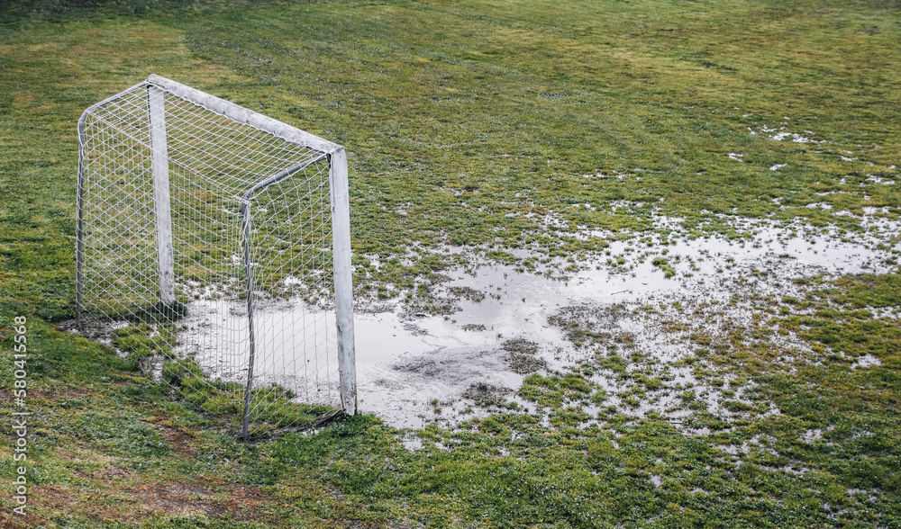 Football field in bad conditions, the grass is waterlogged Stock Photo ...