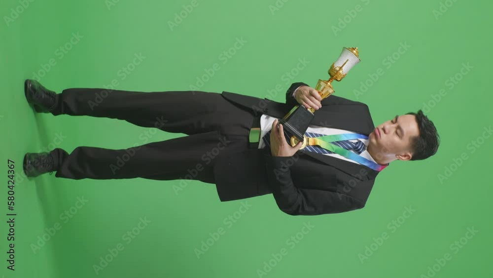 Full Body Of Upset Asian Business Man In A Suit And Tie With A Gold ...