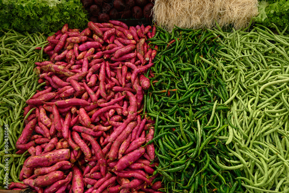 Different Asian organic vegetables sweet potato, green pepper, beans on ...