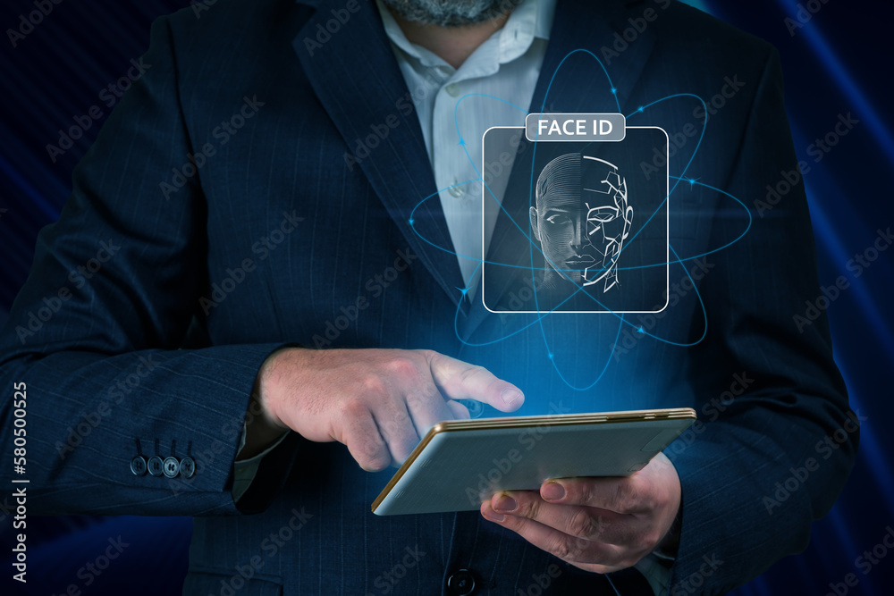 Man using tablet with face id scan and modern technology. Login using ...
