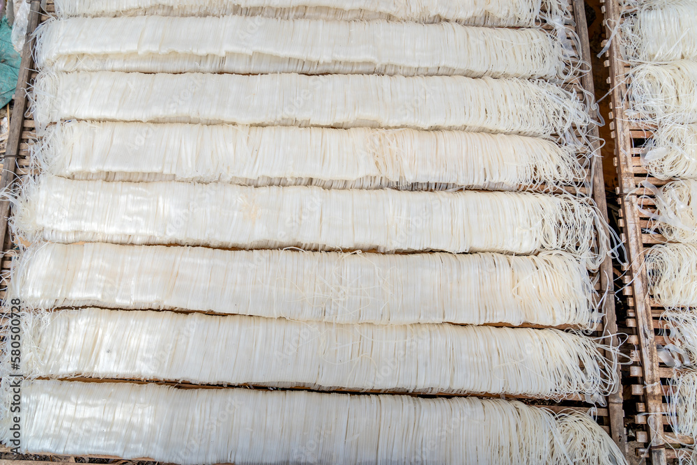 Farmers dry Chu noodles in Bac Giang province, Vietnam. Noodles, also ...