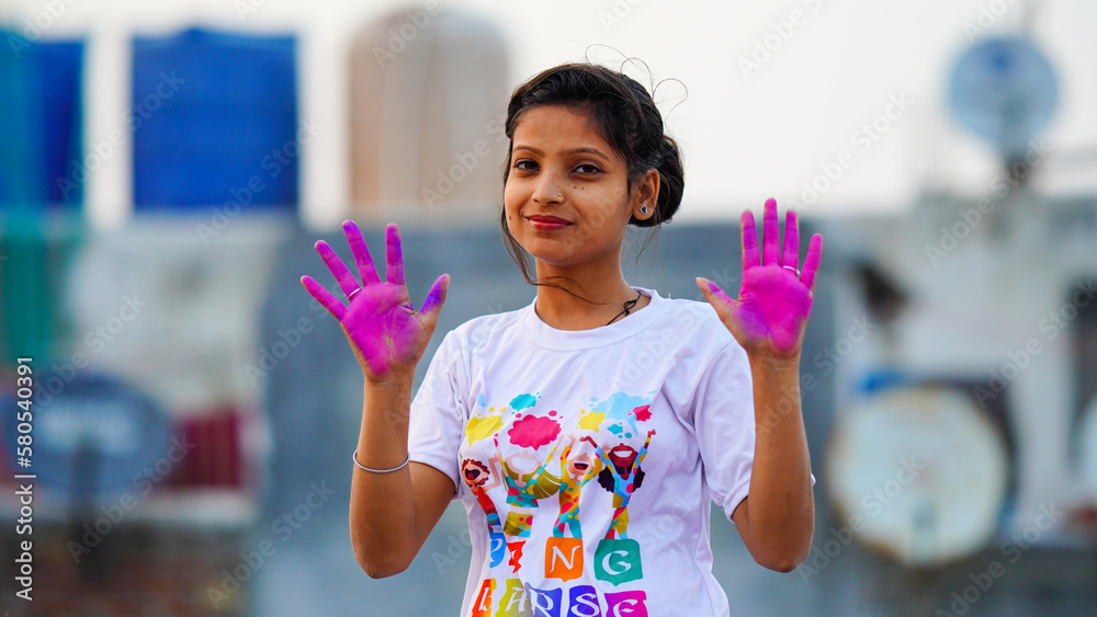 a indian Girl playing holi image HD Stock Photo | Adobe Stock