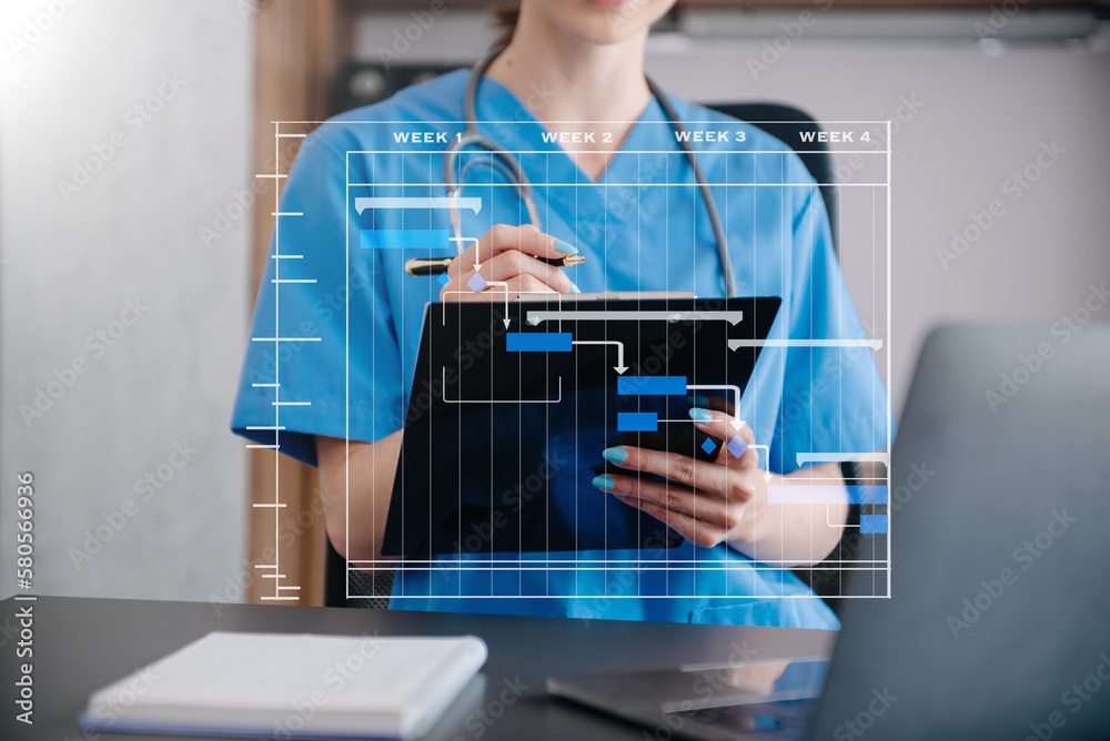 Fototapeta: Project manager working and update tasks with Gantt chart ... Fototapeta: Project manager working and update tasks with Gantt chart ...