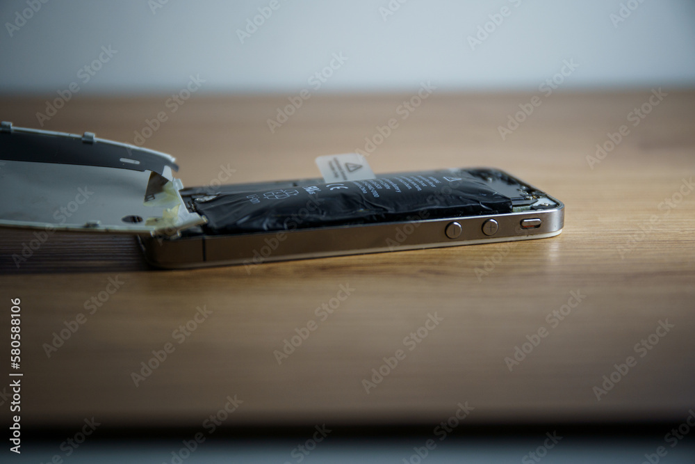 Iphone with exploded Lithium-ion battery. Li-ion swollen battery Stock ...