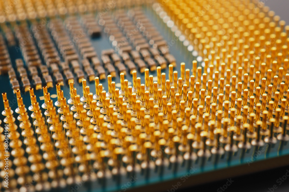 Microprocessor of computer closeup. CPU, semiconductor, pins and ...