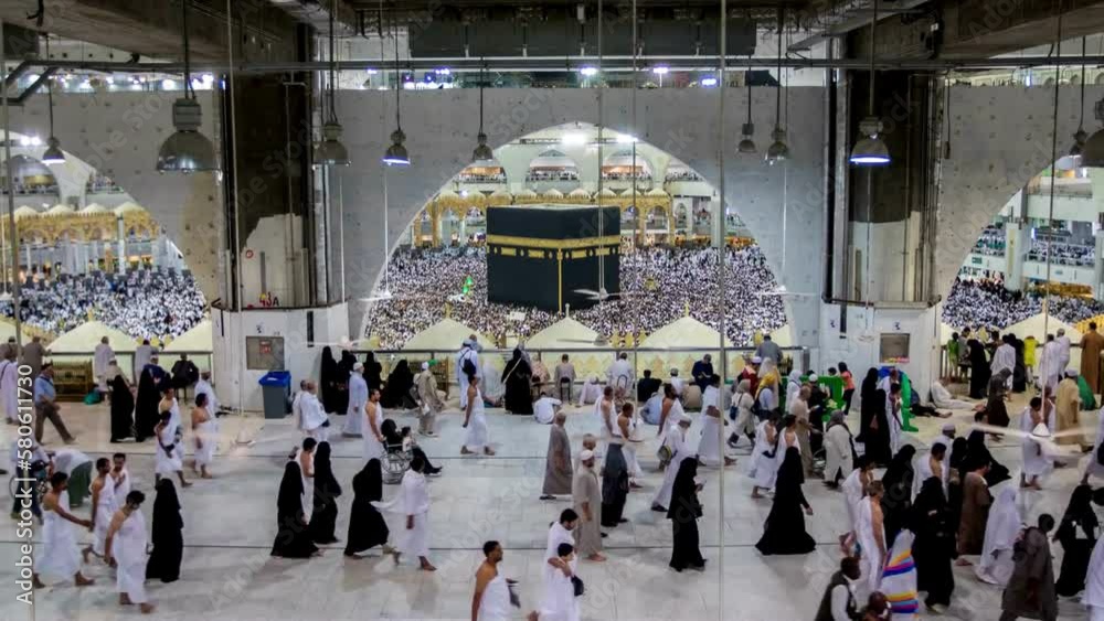 Thousands of Islam pilgrims surge around the Kaaba in Mecca. praying ...