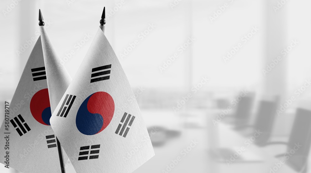 Small flags of the South Korean on an abstract blurry background Stock ...