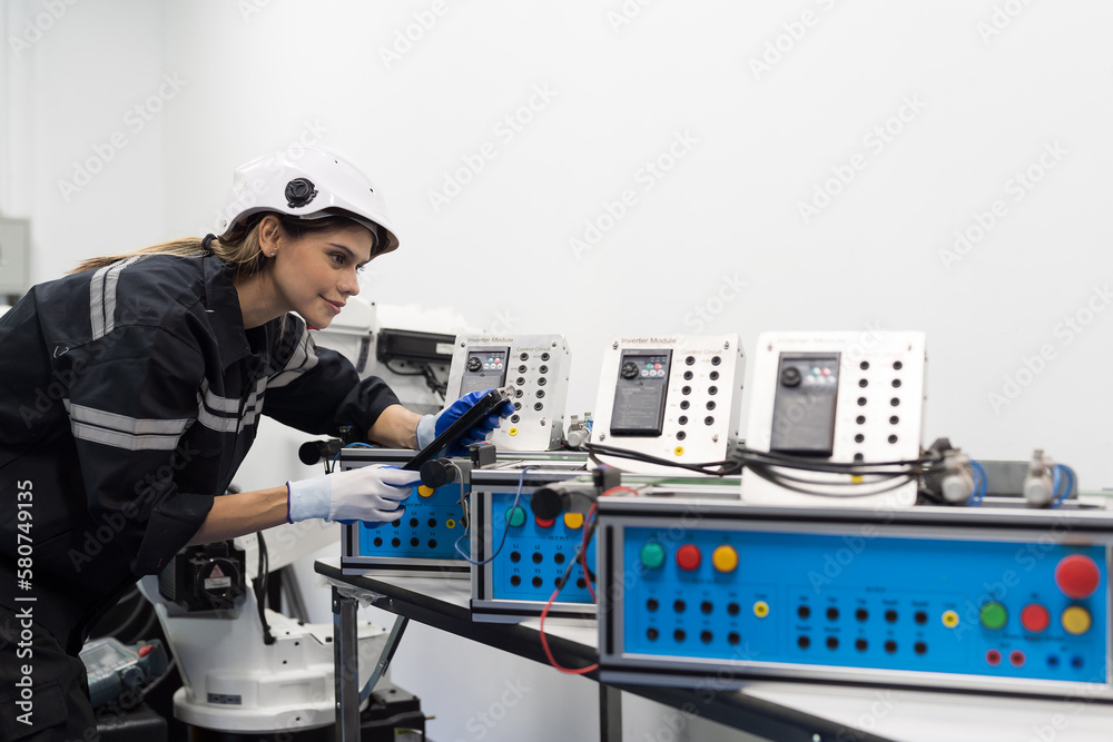 Female engineer control autonomous mobile robot or AMR in the ...