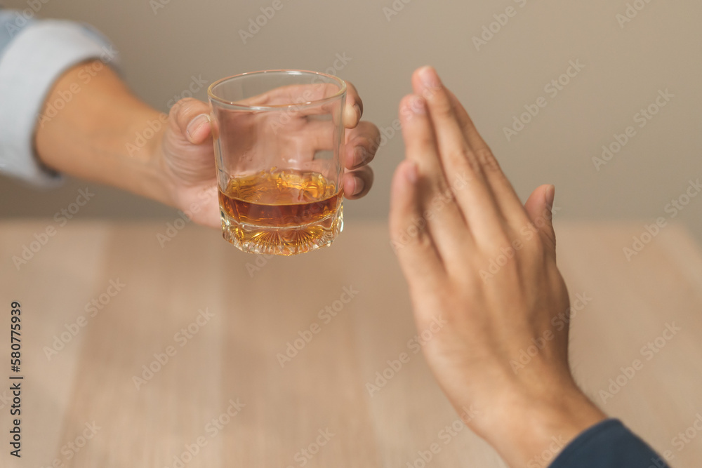 Foto de Alcoholism, sad depressed asian young man, male hand holding ...