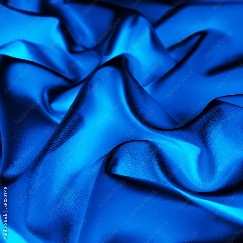 Black blue silk. Shiny fabric. Light. Glow. Liquid wave. Bright color ...