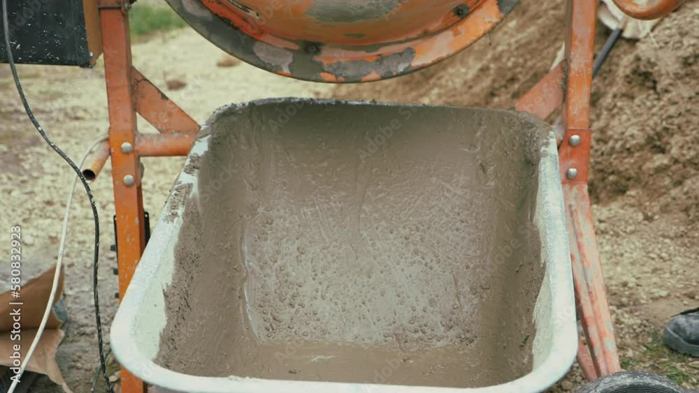 Working process of mixing concrete for the foundation of a private ...