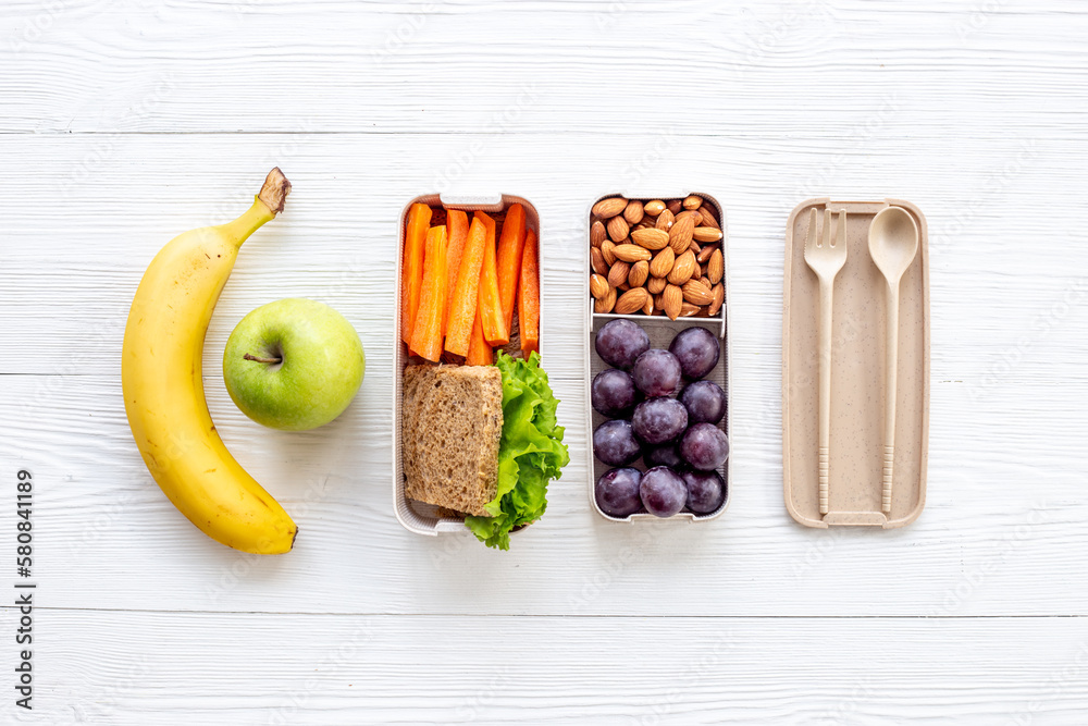 Luch box with sandwiches and bamboo cutlery Stock Photo | Adobe Stock