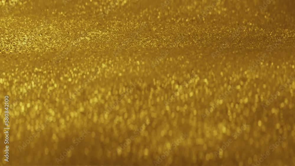 Glittering gold sand wavy texture, shiny golden sparkling particles ...