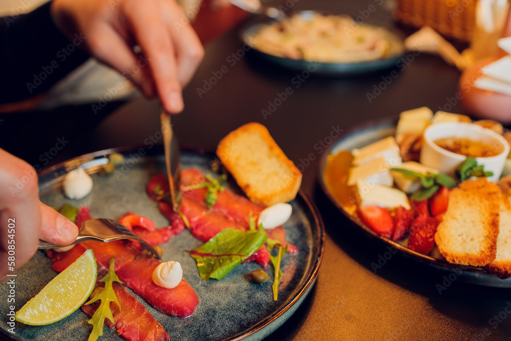 Breakfast plate with traditional spanish food, jamon, fried egg, potato ...