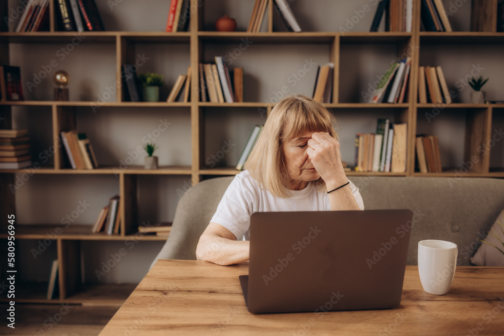 Overworked tired older lady holding glasses feeling headache, having ...