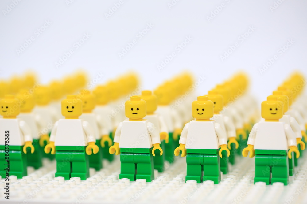 Hong Kong -March 15 2023: crowd of minifigures stand together with bald ...