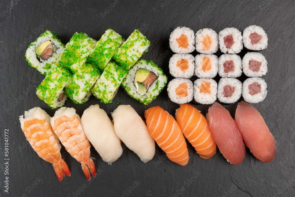 Foto de Above ground Japanese sushi food. Maki and rolls with tuna ...