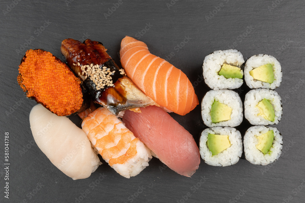 Above ground Japanese sushi food. Maki and rolls with tuna, salmon ...