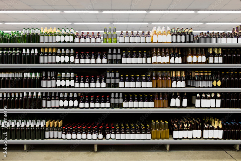 Beer labels on shelf in supermarket Suitable for presenting new beer ...