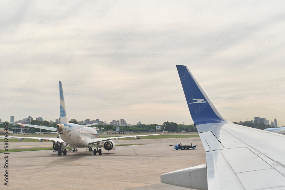 Airfield and airplane view from a window of a Boeing 737-700 jet of ...