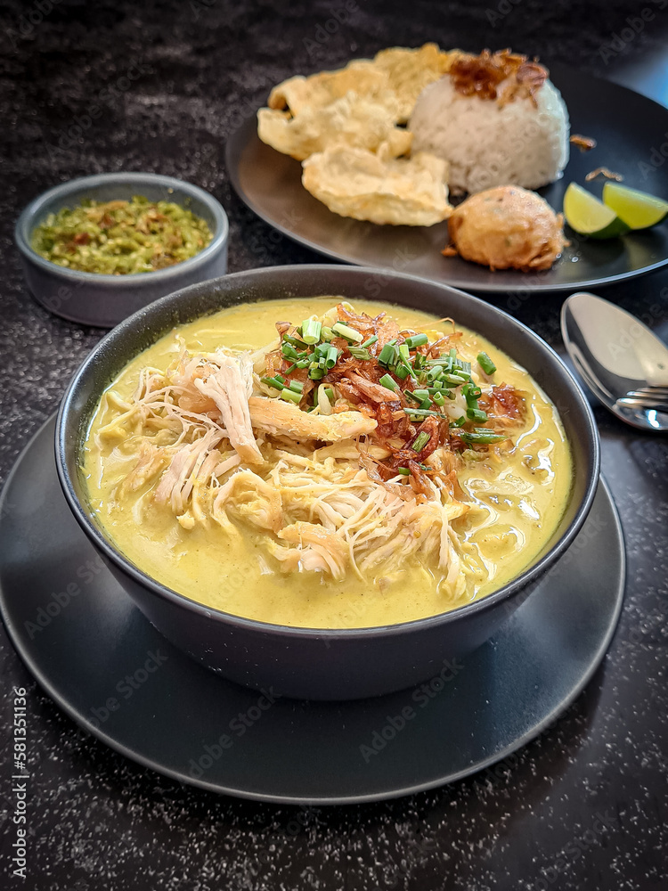 nasi soto ayam is traditional Indonesian yellow soup mainly composed of ...