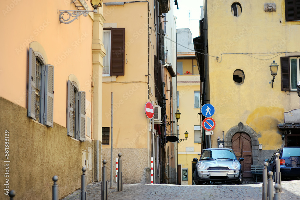 Narrow old streets of the famous Pitigliano town. Beautiful italian ...