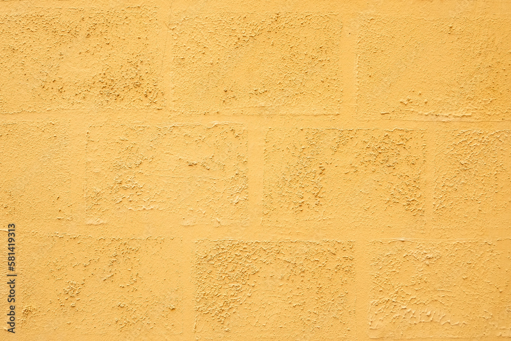 Old yellow concrete block wall background and texture for background ...