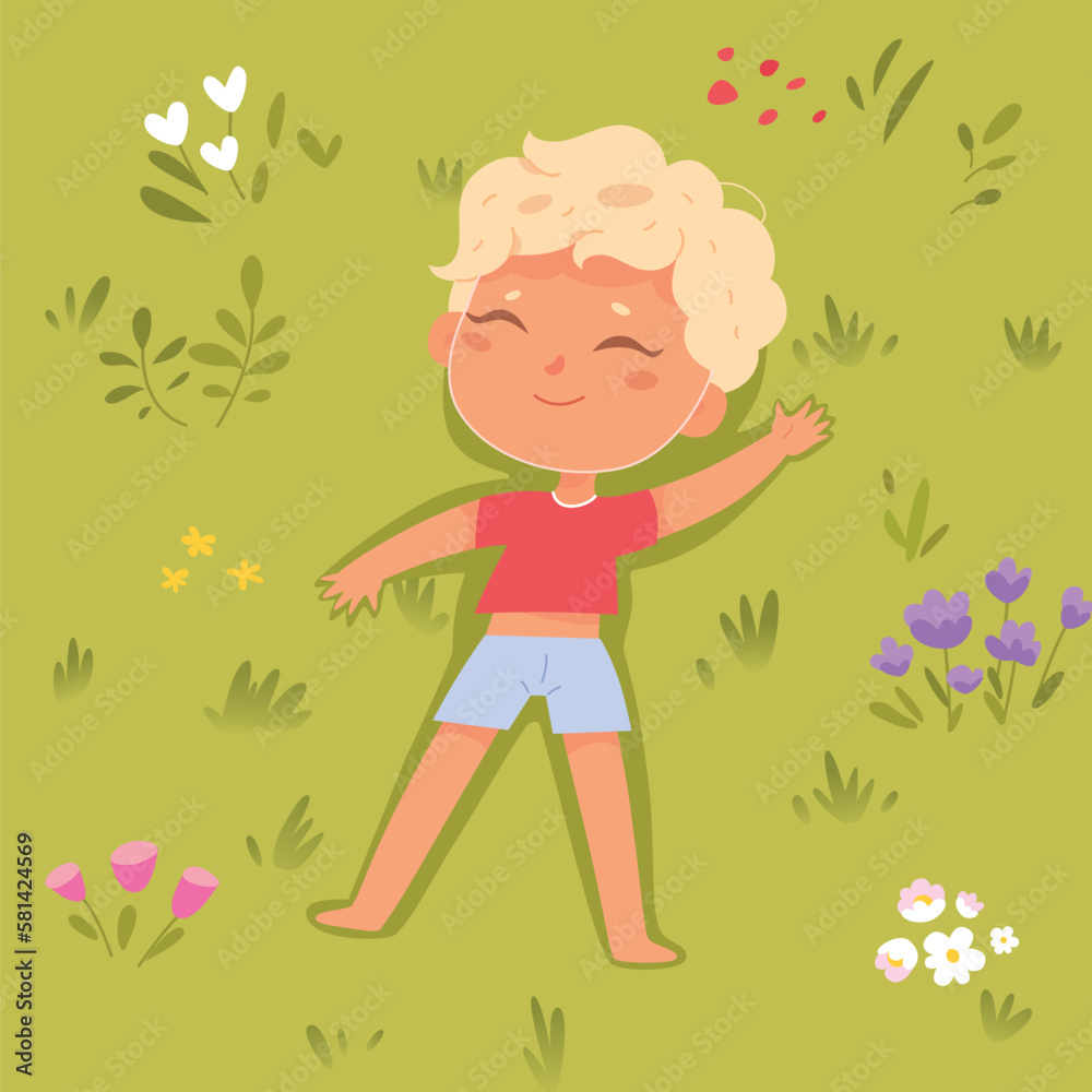 Cute child lying on green grass of summer park with lawn or playground ...