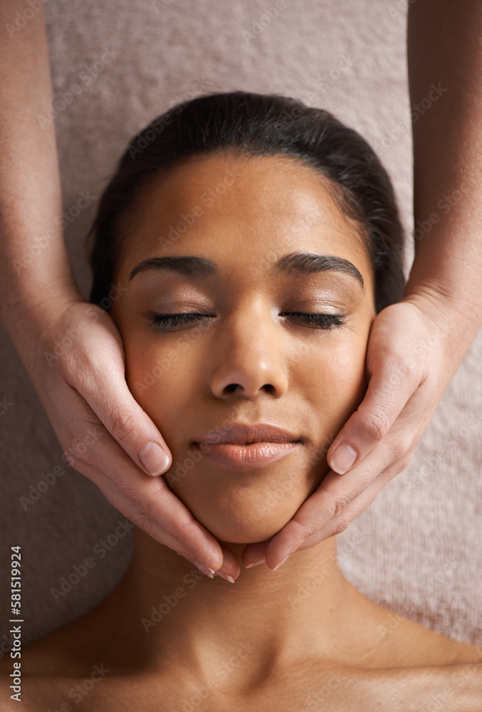Massaging The Body And Mind A Beautiful Young Woman Getting A Head Massage At A Spa Stock