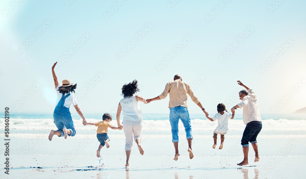 Foto de Grandparents, parents and child jump at beach for bonding ...