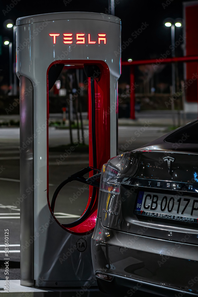 Tesla model s at Supercharger station TESLA. Vertical photo. Belgrade ...