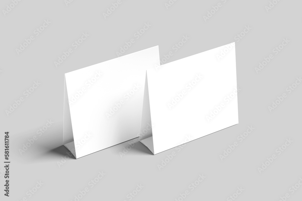 blank and white table tent on grey background. suitable to make good ...