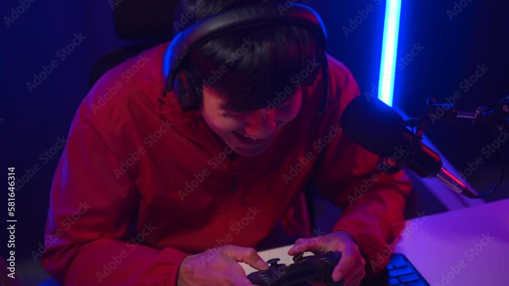 Close up Gamer man playing game and podcast steaming wearing headset ...