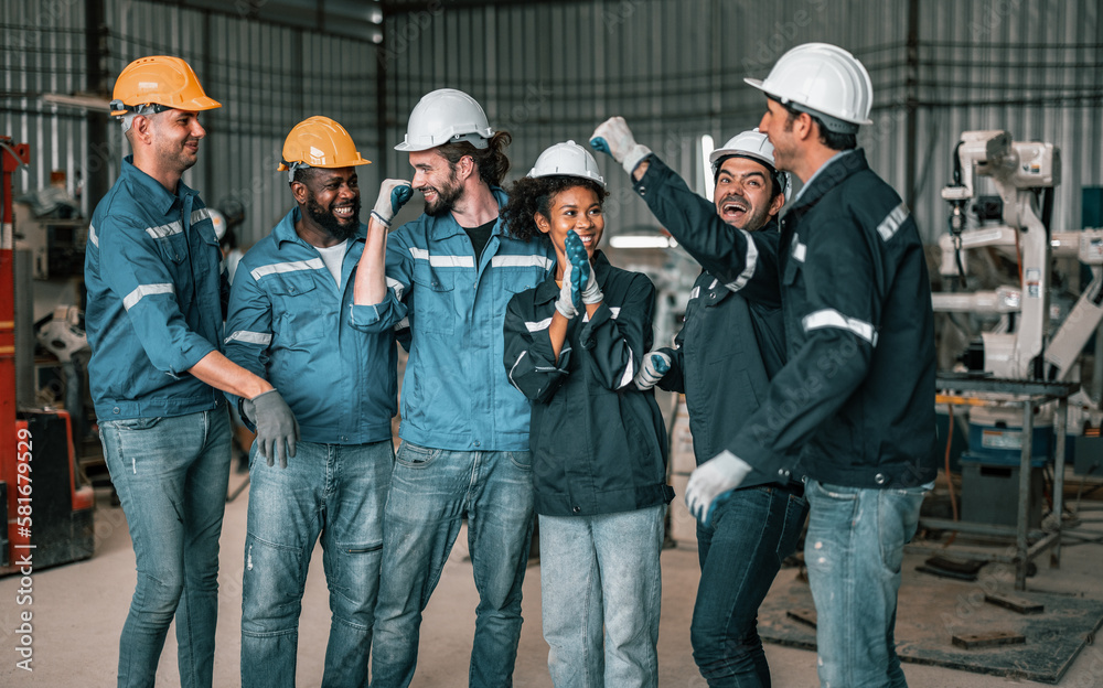 The team of expert robotic operators celebrates their personal ...