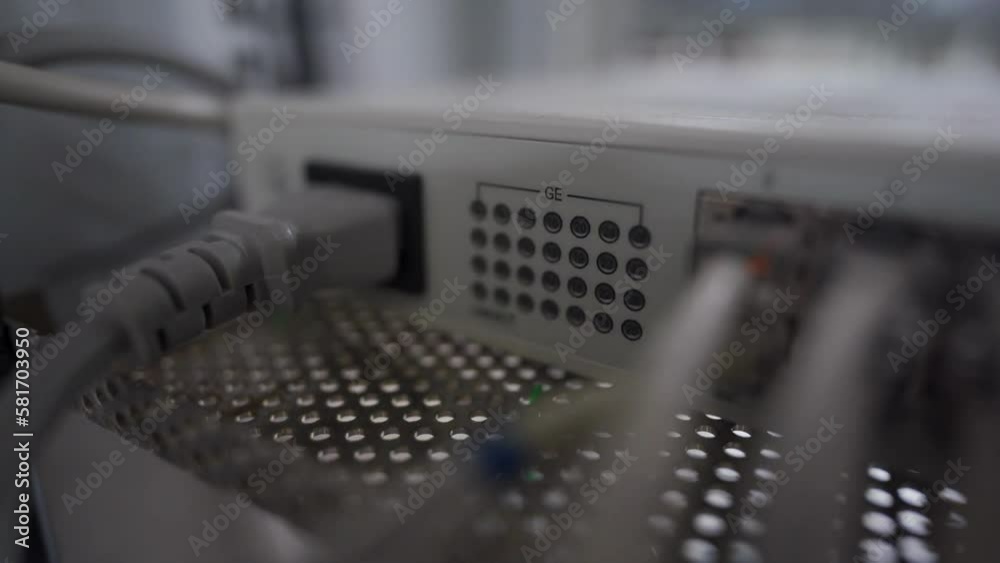 Server rack with light switch boards and Cables. inside data center ...