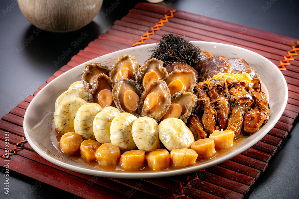 traditional giant hot pot Peng cai with dry seafood abalone sea ...