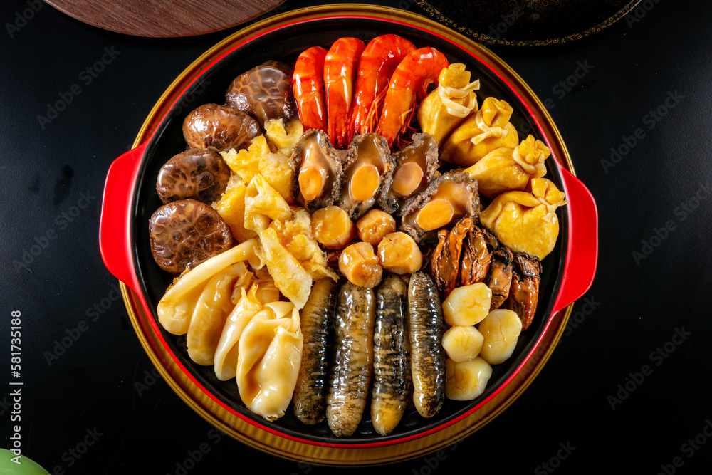 traditional giant hot pot Peng cai with dry seafood abalone sea ...