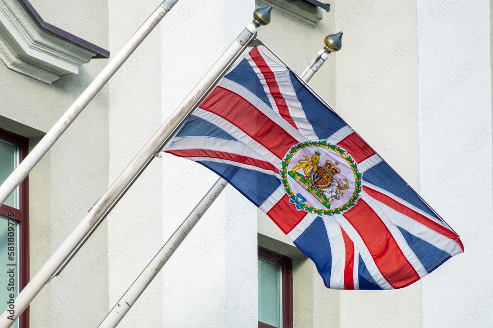 Flag of the United Kingdom of Great Britain with the coat of arms on ...