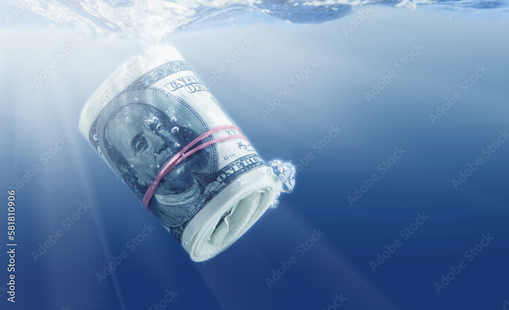 Conceptuall image of US Dollar sinking in water as symbol of global ...