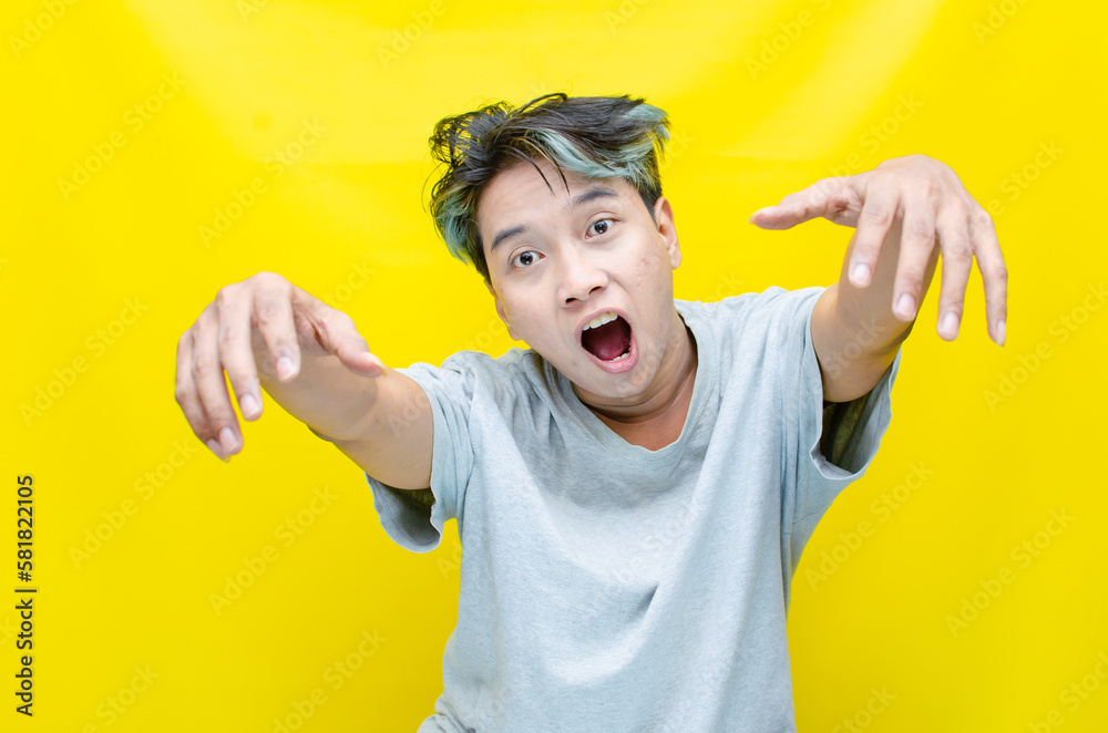 Crazy Happy Asian Man with funny Hairstyle making Grimace Silly funny ...