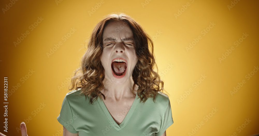 A woman screaming with crazy expression. Screaming, hate, rage. Crying ...