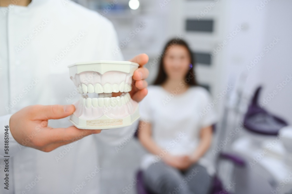 dental doctor. dentist shows model of Jaws. Visual aid for training ...